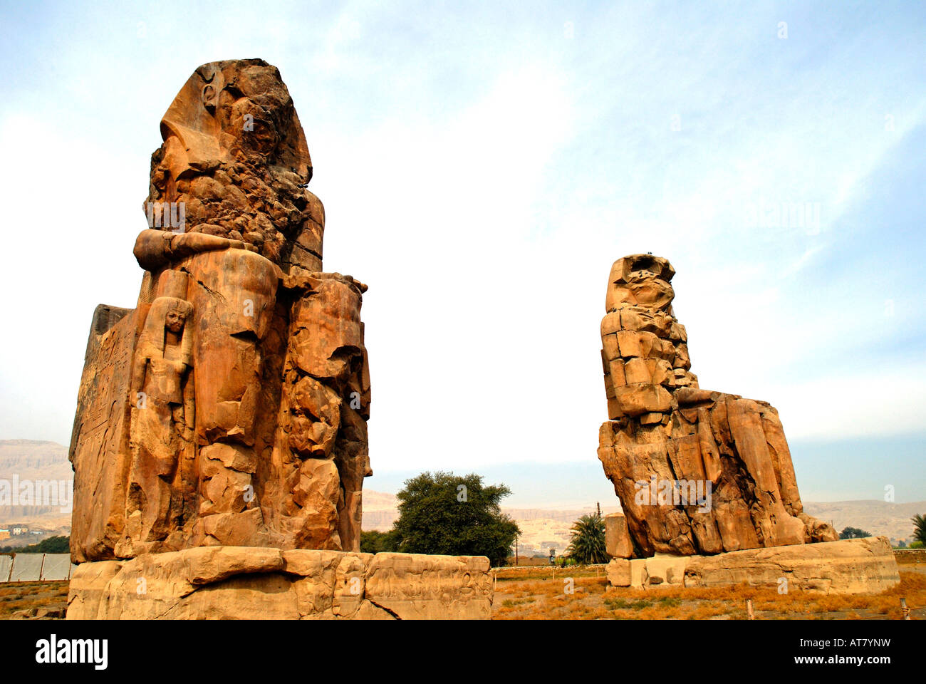 The Colossus of Memnon on the outskirts of Luxor in Egypt are two ...