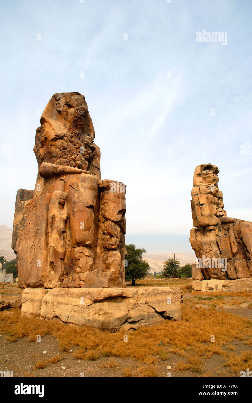 The Colossus of Memnon on the outskirts of Luxor in Egypt are two ...
