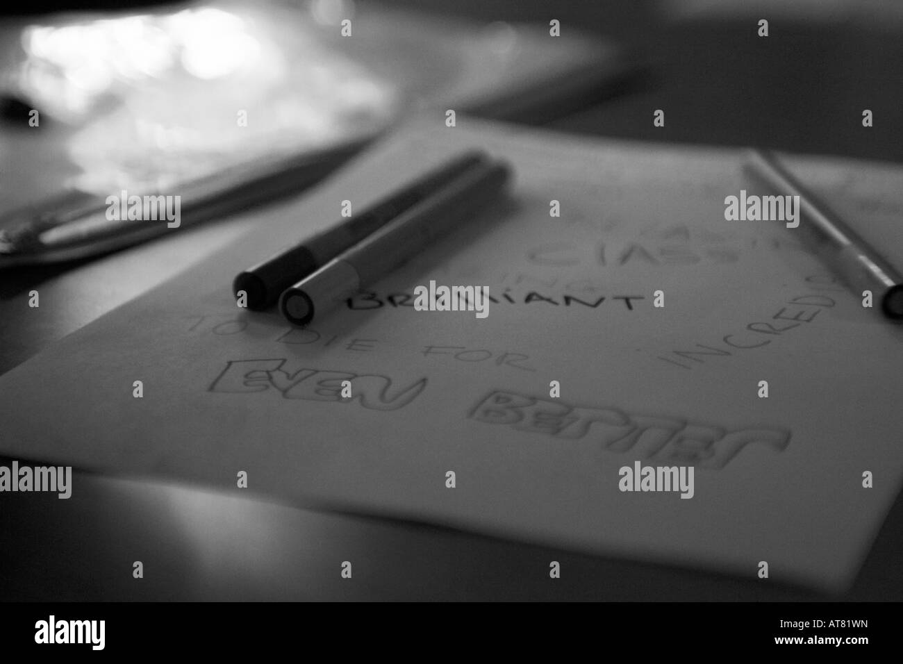 handwritten positive slogans on a piece of paper with felt tip markers ...