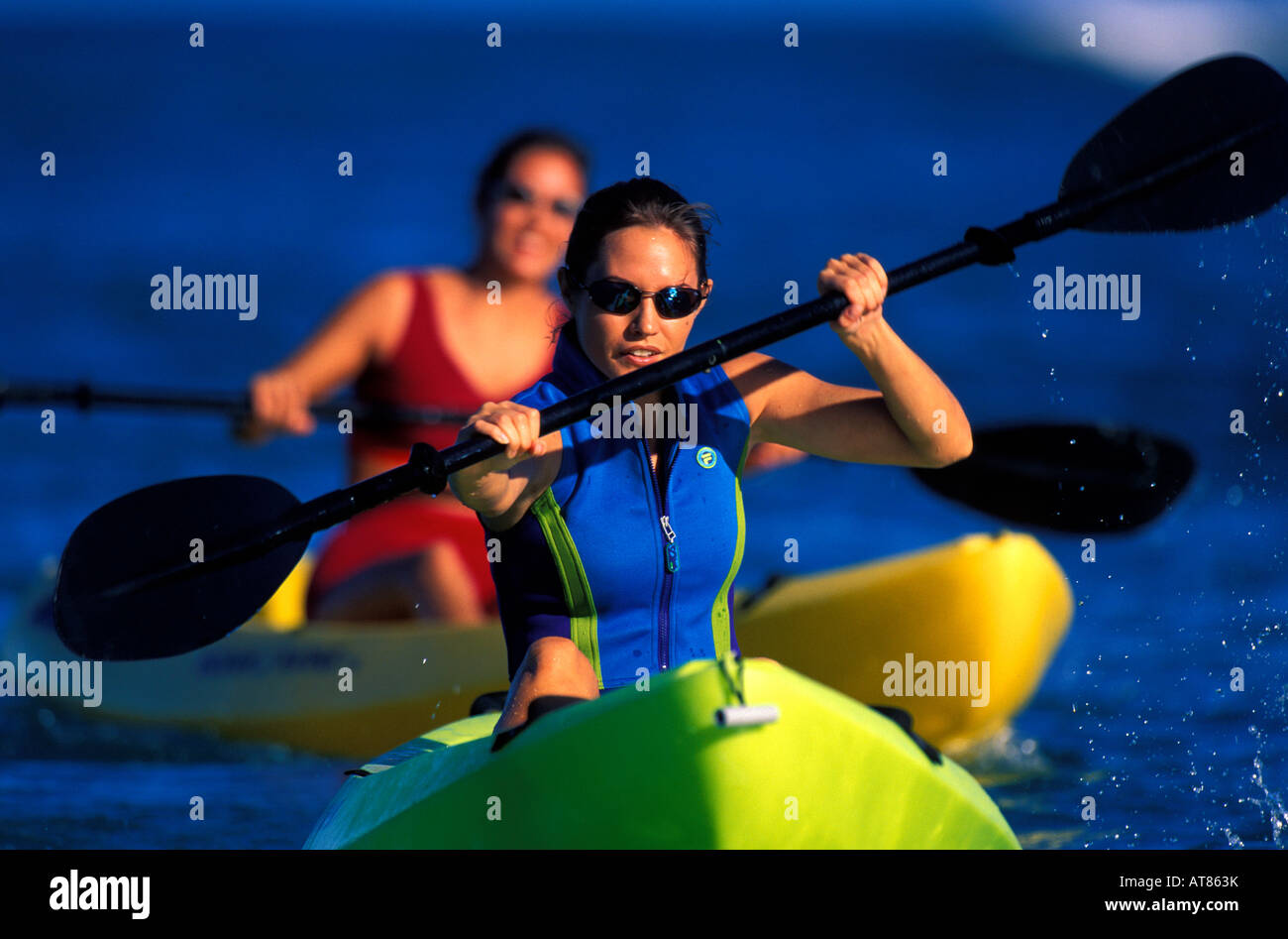 Two friends ocean canoeing on the Big Islalnd Stock Photo - Alamy