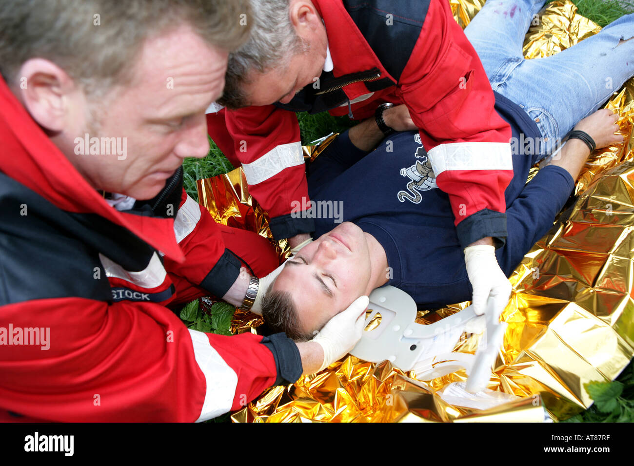 Rescue, paramedics, first aid after an accident with a man injured at ...