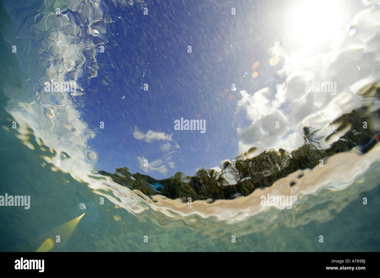 underwater photography of wave breaking on the beach under the sun ...