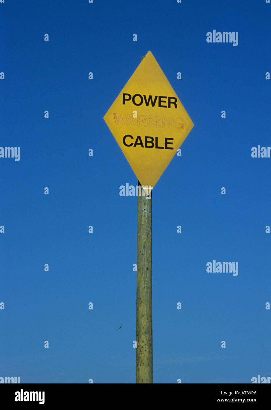Power Cable Warning Sign in the uk Stock Photo - Alamy