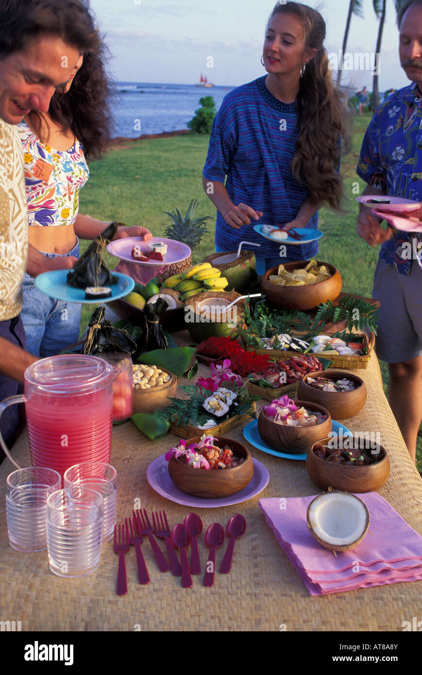 People enjoying outdoor buffet near the beach Stock Photo - Alamy