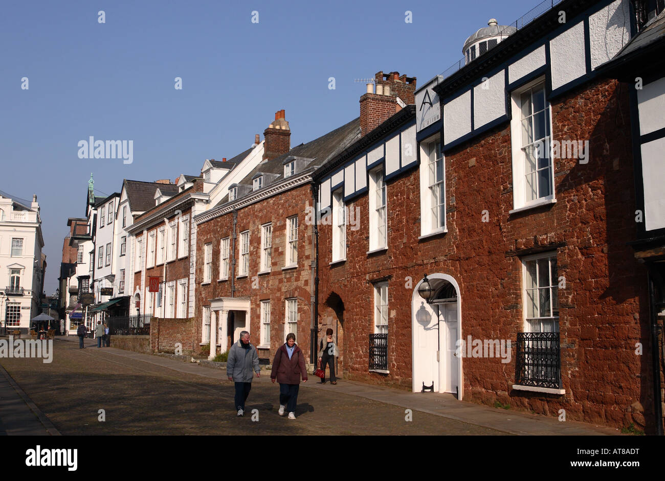 Exeter Devon visitors and old buildings along the elegant Cathedral ...