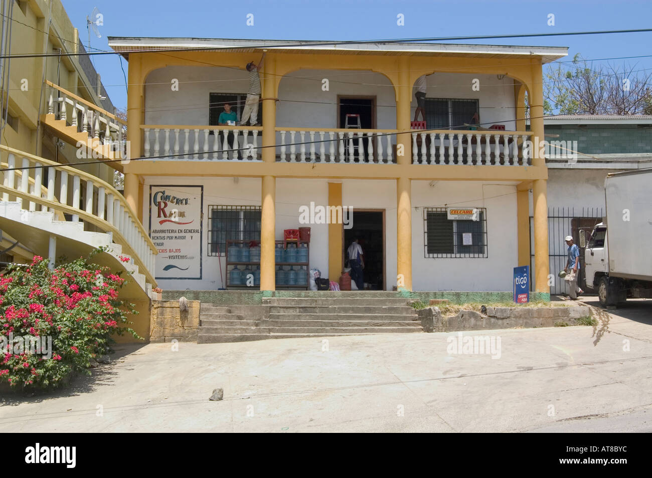 Building with yellow columns Roatan Honduras Stock Photo - Alamy