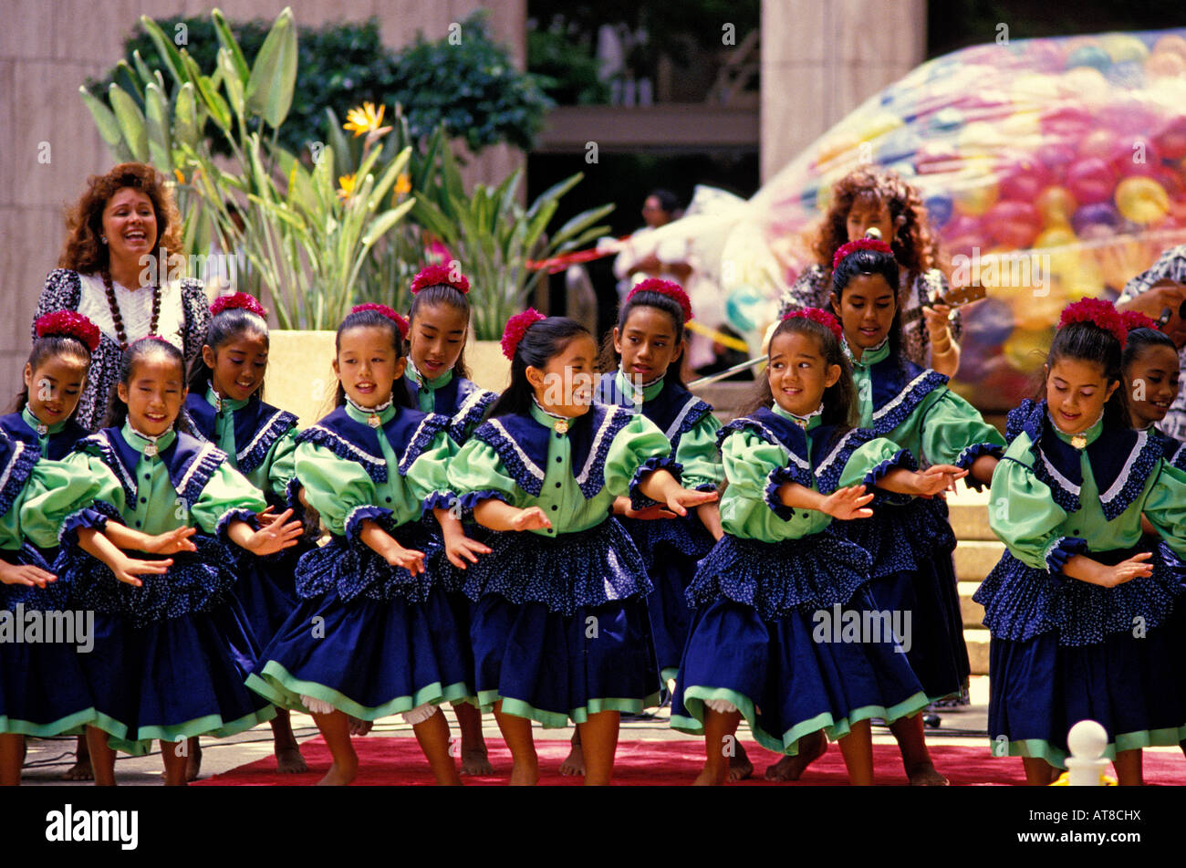 A group of young girls perform a keiki (children's) hula at Tamarind ...