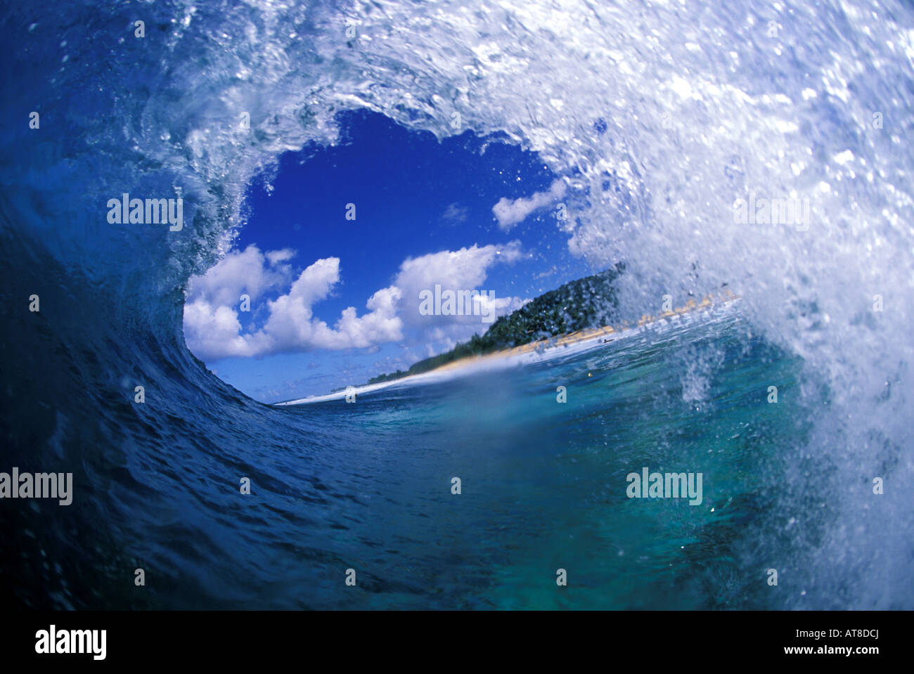 Looking out from beneath the waterfall of a wave at Pipeline Stock ...