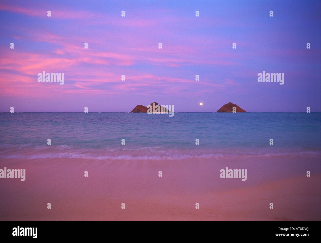 Moonrise at Lanikai beach with Moku Lua islands, Oahu Stock Photo - Alamy