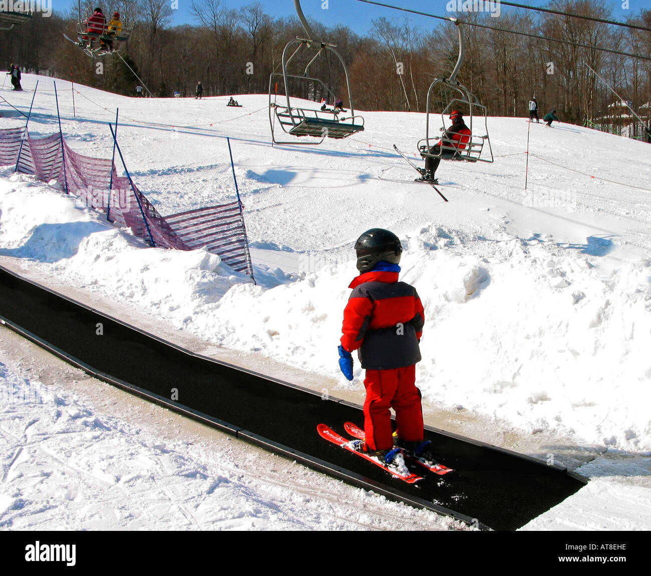 Child learning how to ski Stock Photo - Alamy