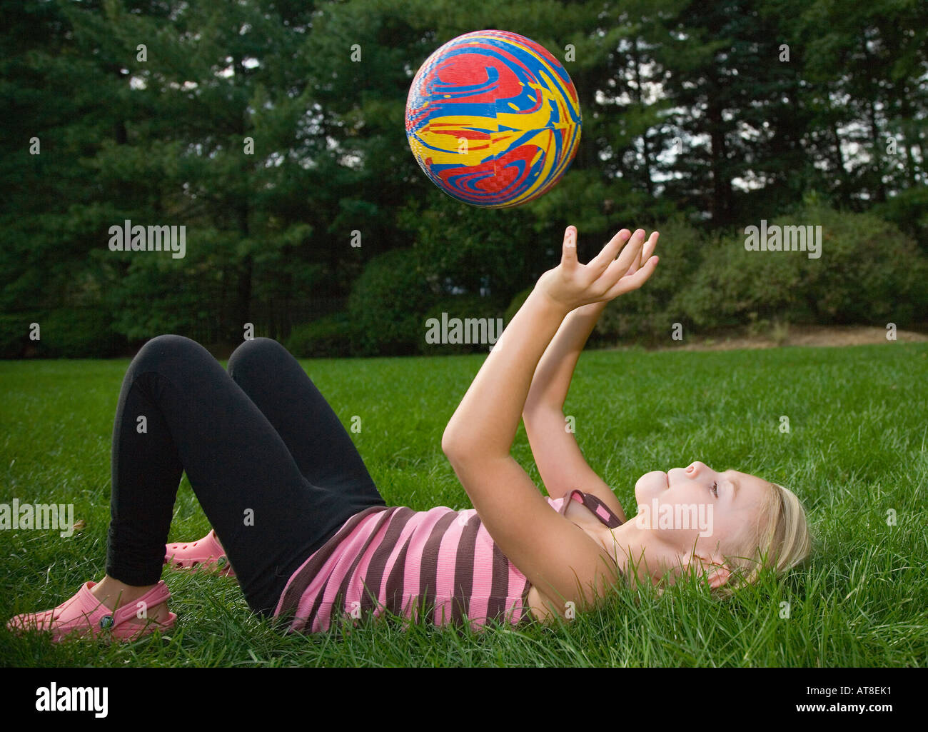 Child tossing ball air hi-res stock photography and images - Alamy