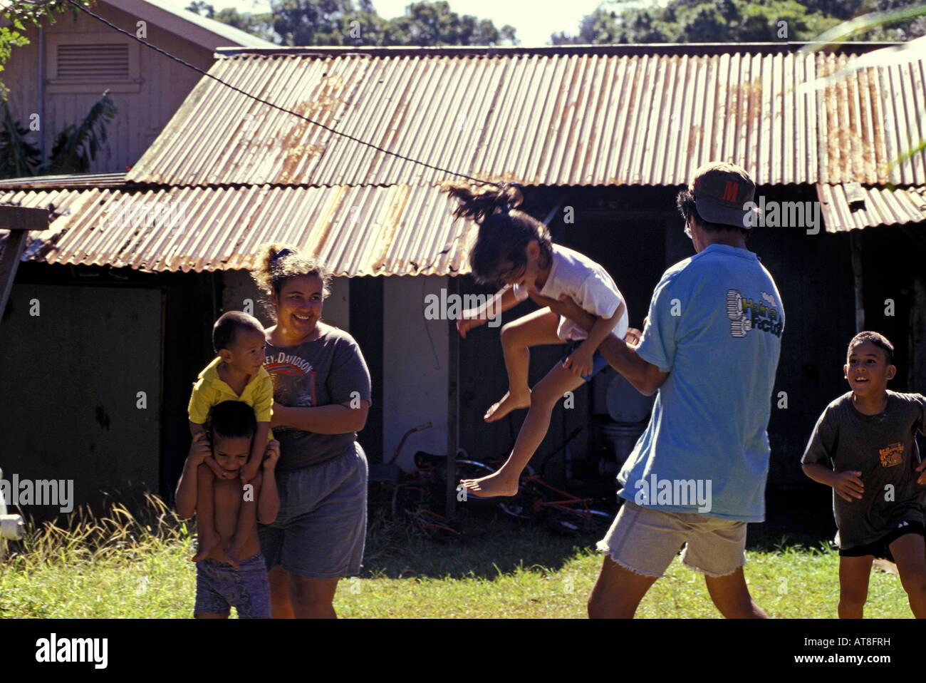 Parents playing with their children, Big Island, Hawaii Stock Photo - Alamy