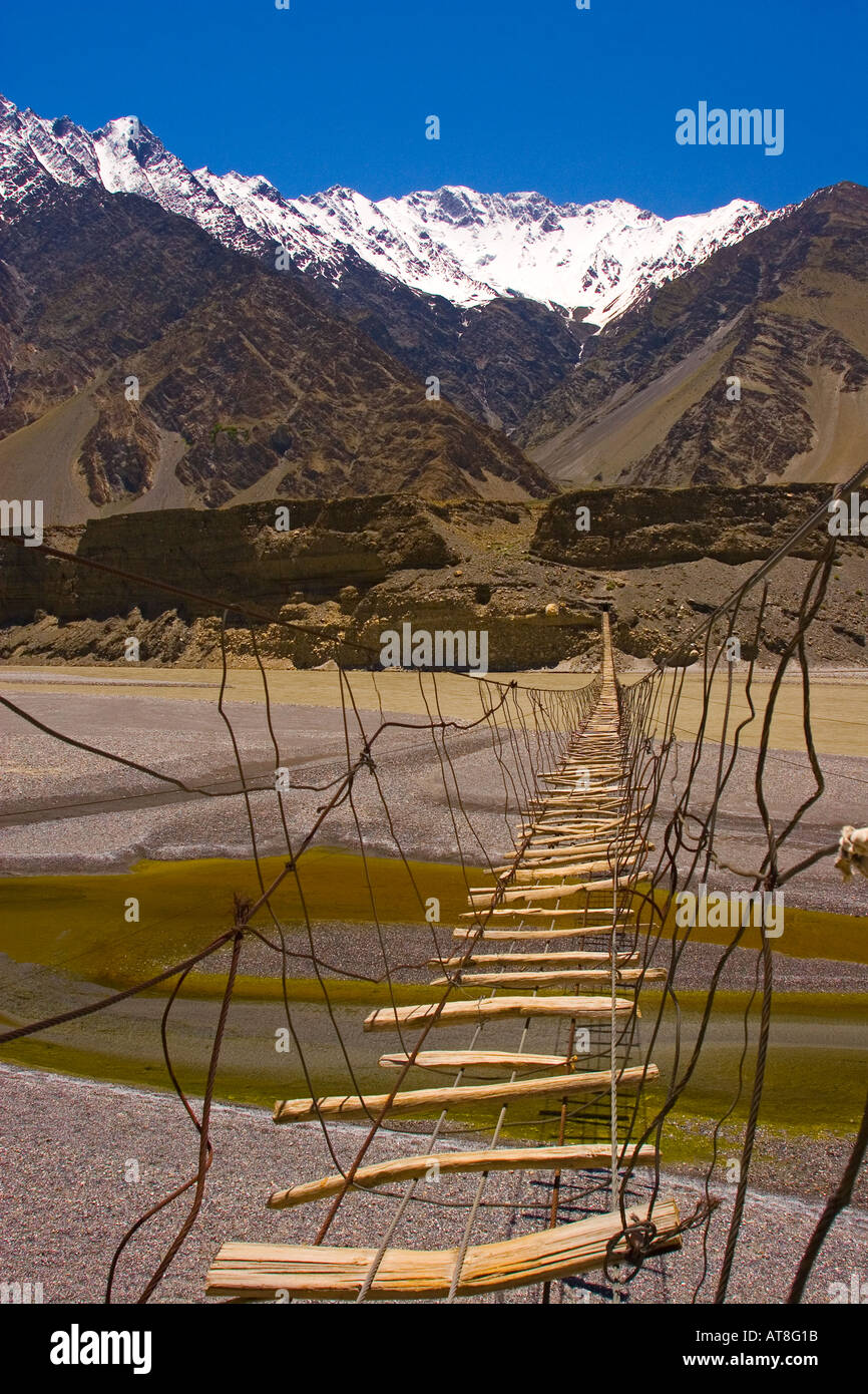 A scary suspension bridge hanging over Hunza river in Passu Pakistan ...