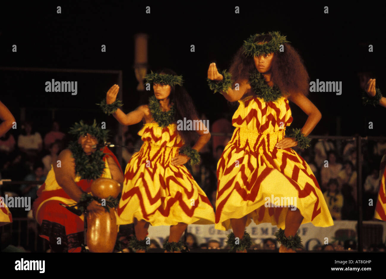 Hula dancers performing a kahiko, ancient, dance at the Merrie Monarch ...