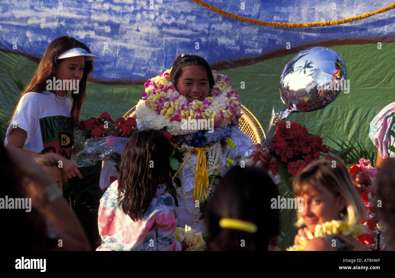 Lei giving hi-res stock photography and images - Alamy