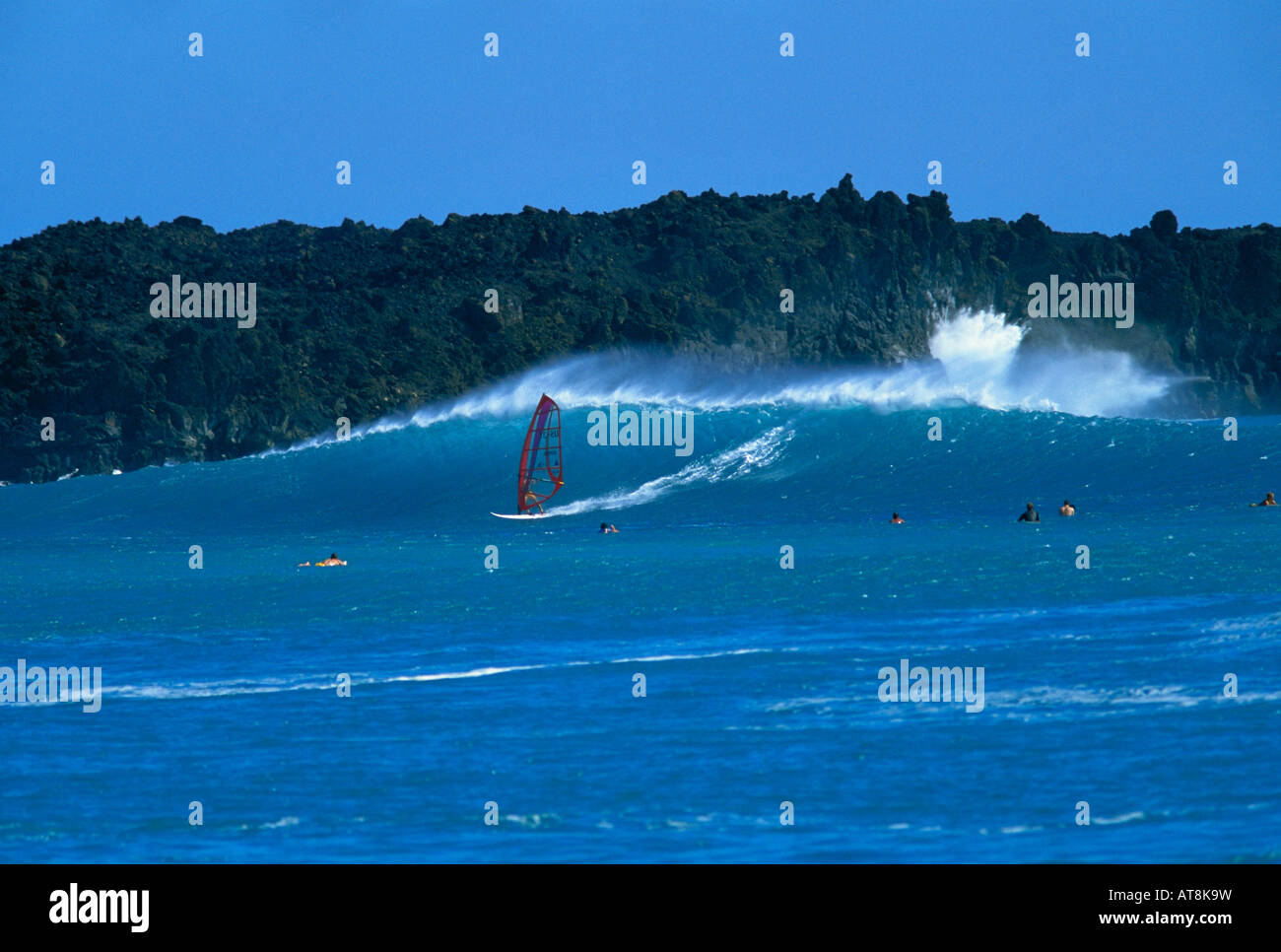 Windsurfing on a beautiful blue wave at La Perouse Bay on Maui Stock ...