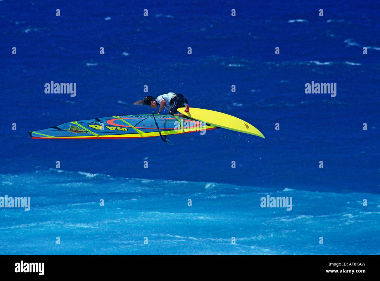 An airborne windsurfer at world famous Hookipa Beach Park, Maui Stock ...
