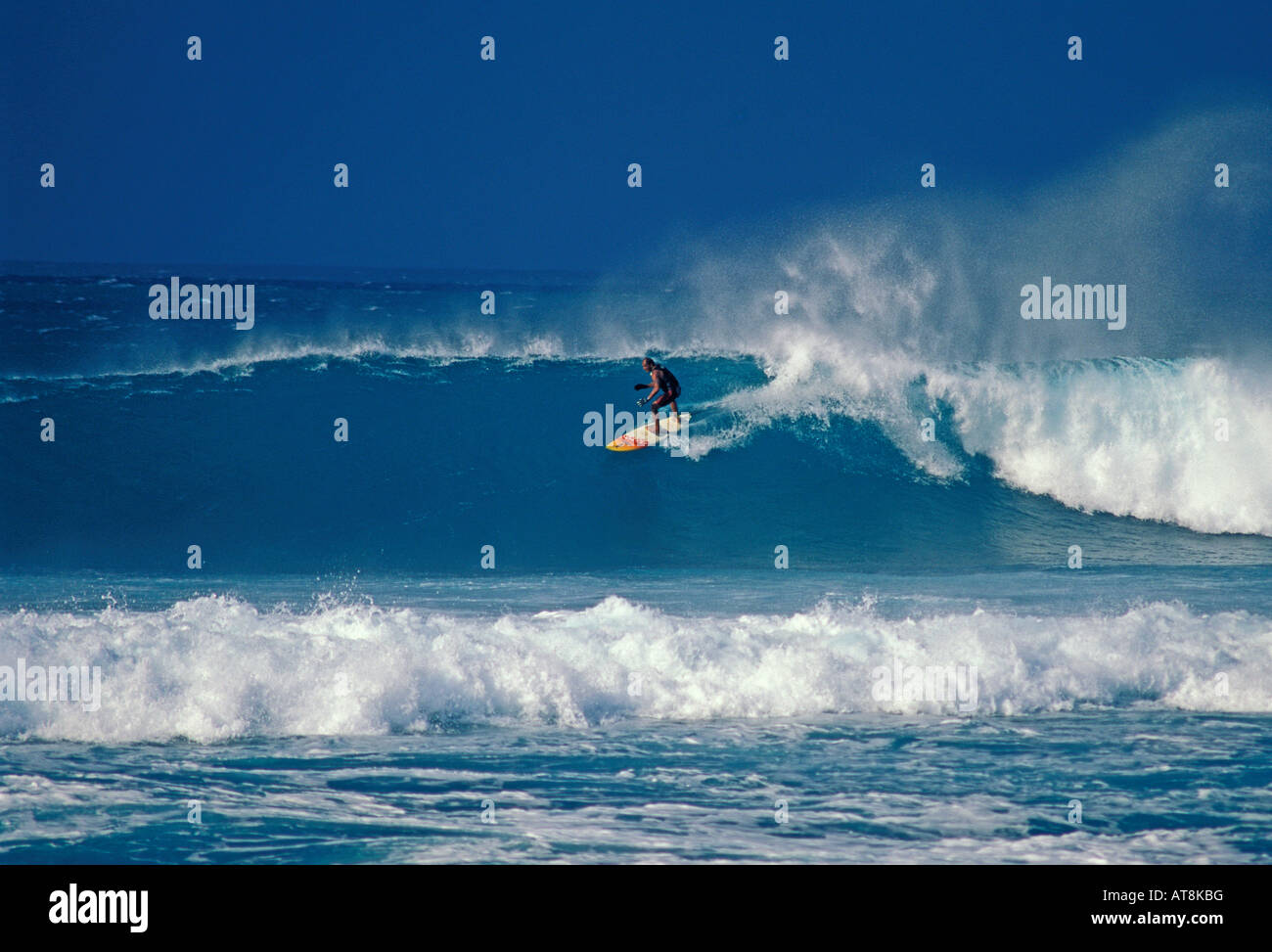 Surfing off Hookipa beachpark on Maui Stock Photo - Alamy