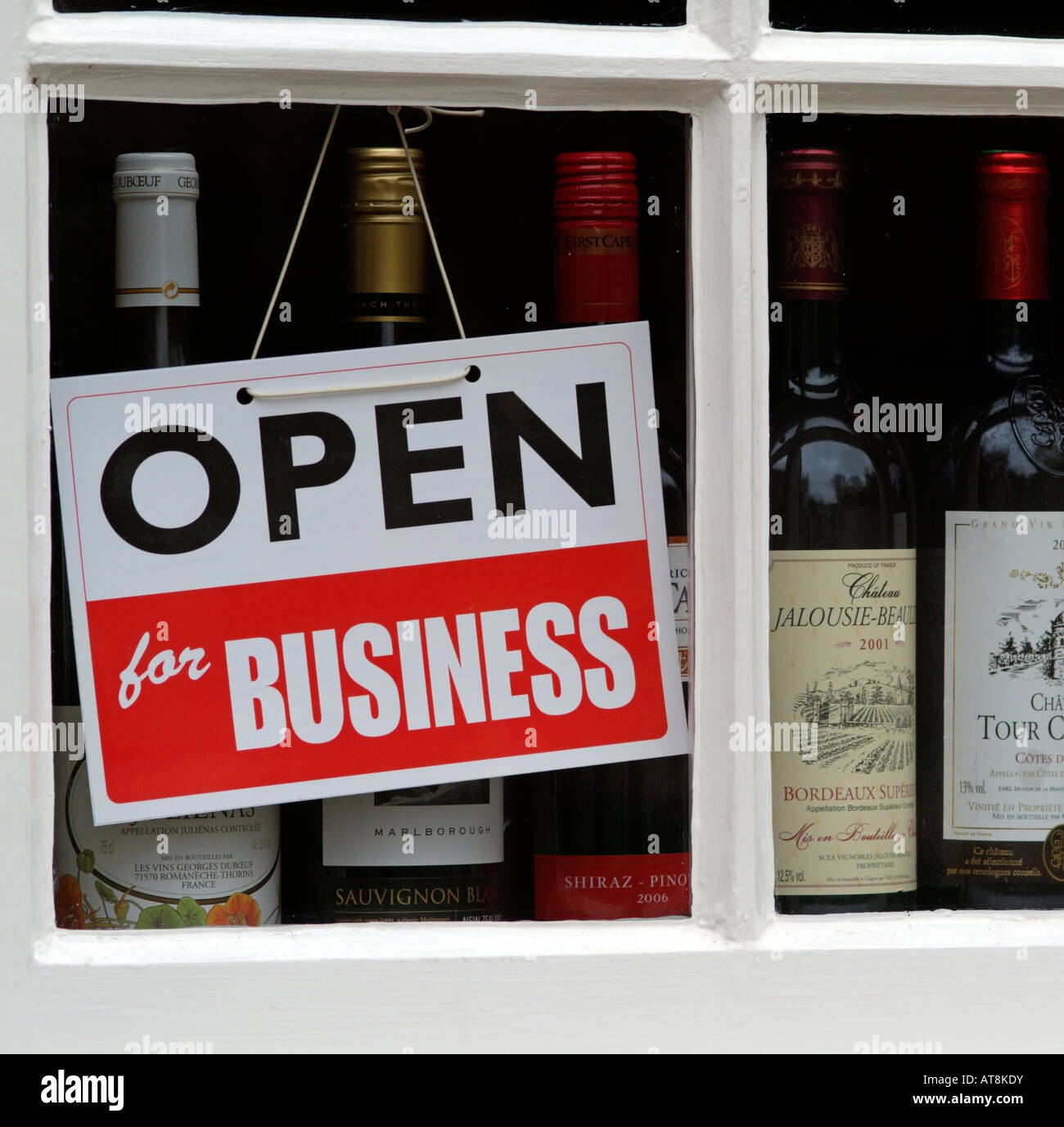 Hanging Sign in wine shop window Open For Business Stock Photo - Alamy
