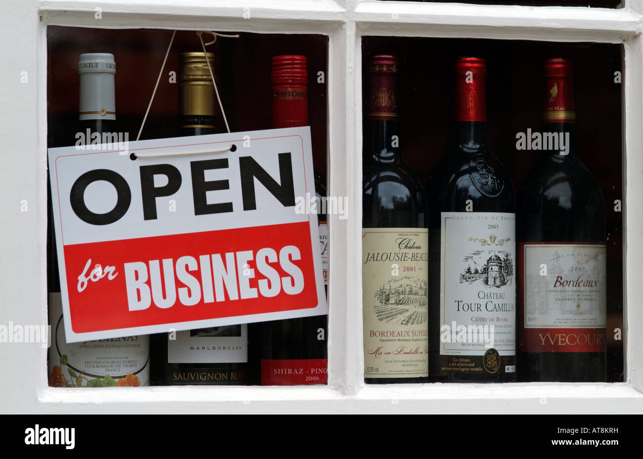 Hanging Sign in wine shop window Open For Business Stock Photo - Alamy