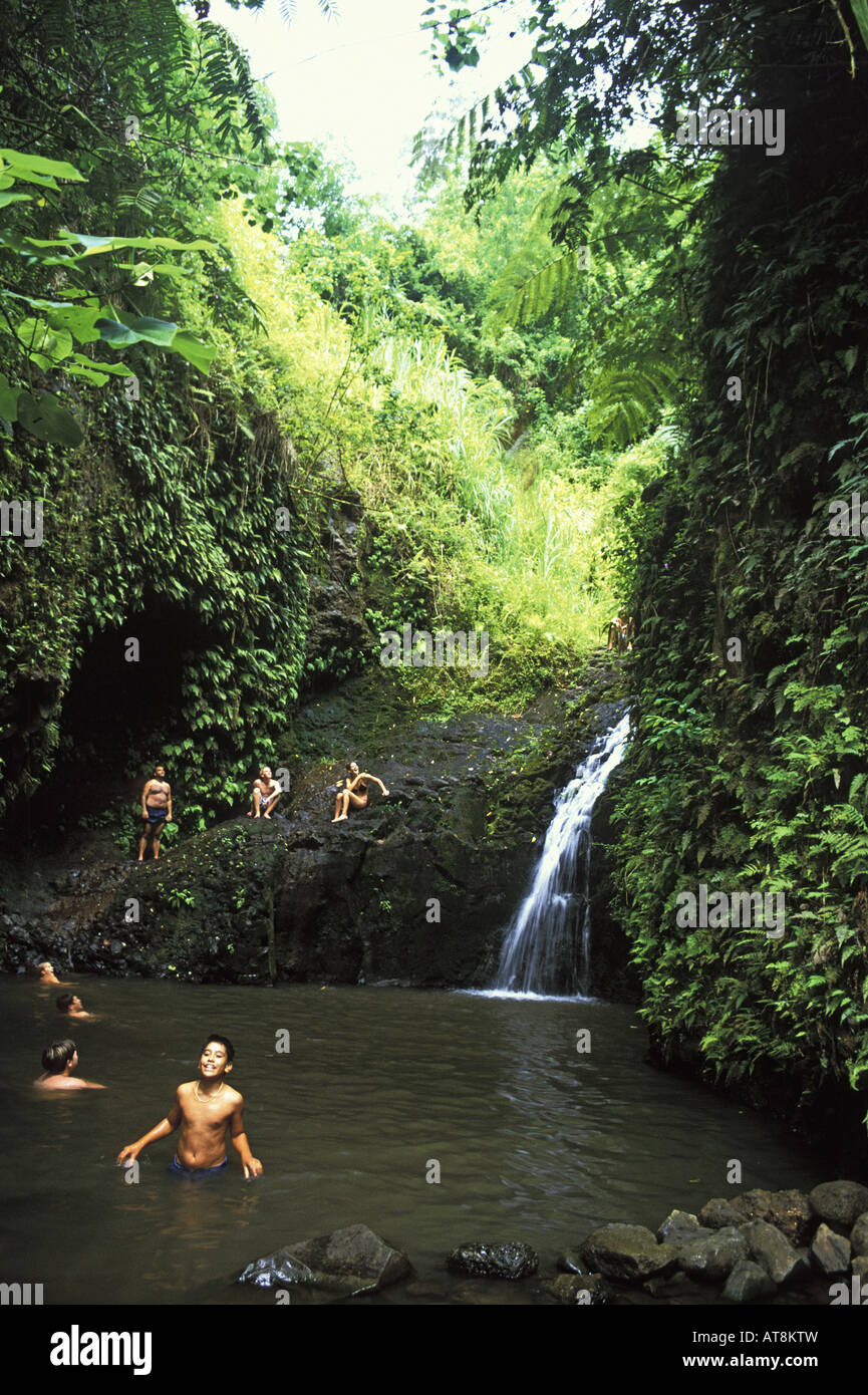 EDITORIAL ONLY. Hikers splash in a mountain pool at the end of ...