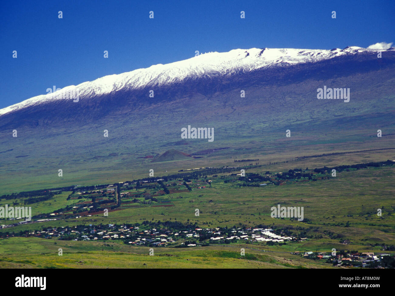 Town of Waimea with snow capped Mauna Kea in background Stock Photo - Alamy