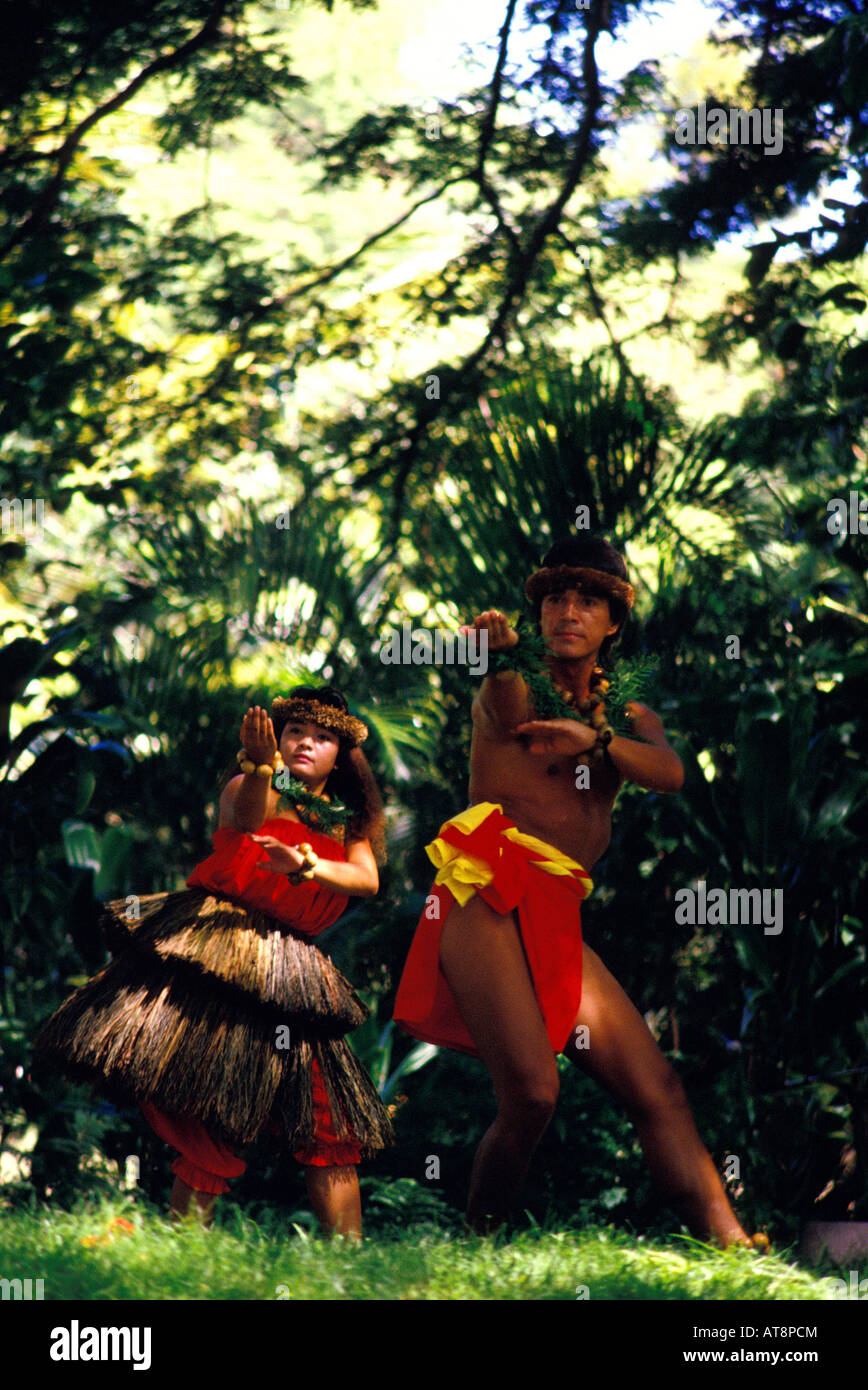 Male and female from Halau O Waimea dance hula kahiko (traditional ...