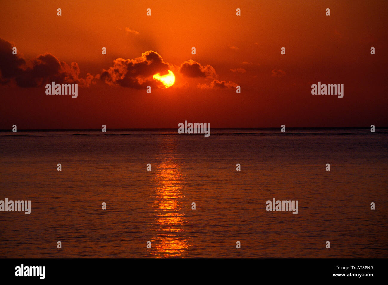 A beautiful orange and red sunset off the Waianae Coast of Oahu Stock ...
