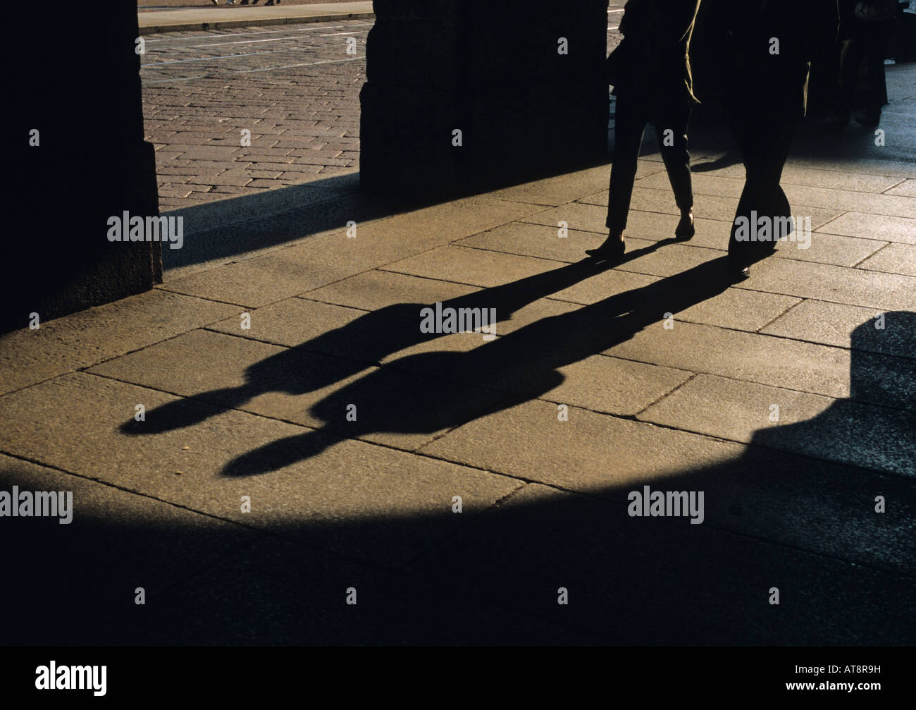 Two human shadows on street hi-res stock photography and images - Alamy