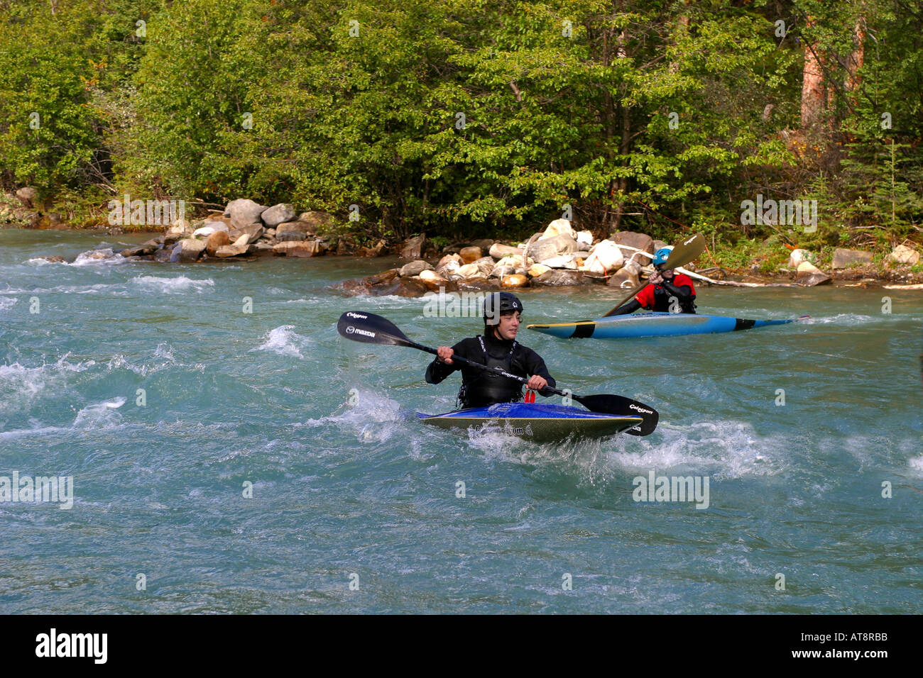 Kayaks on a dangerous river Stock Photo - Alamy