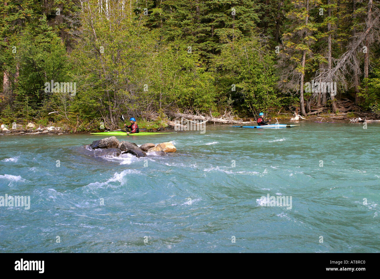 Kayaks on a dangerous river Stock Photo - Alamy