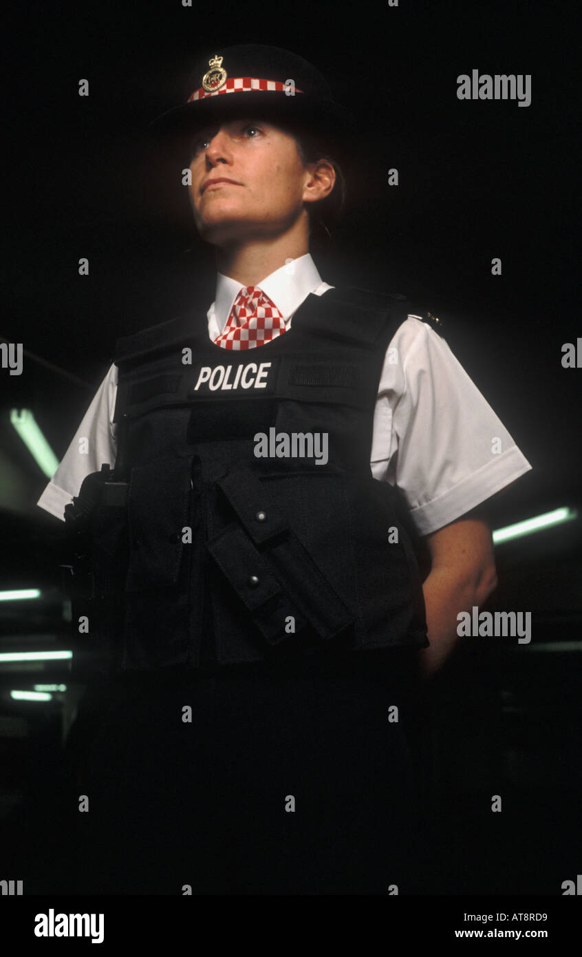Female police officer wearing bullet roof vest , London Stock Photo - Alamy