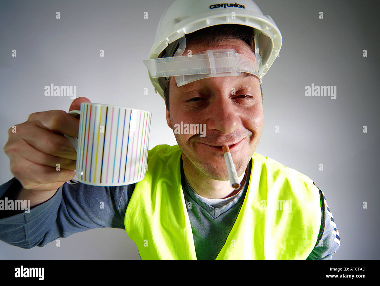 Typical construction worker at break time Stock Photo - Alamy