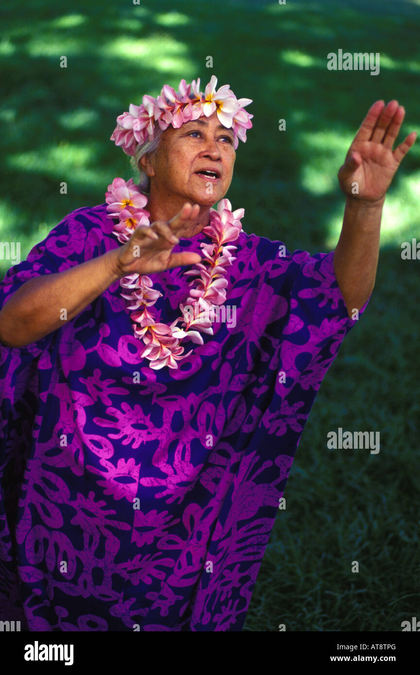 Auntie dancing an auana ( modern) hula with plumeria leis Stock Photo ...