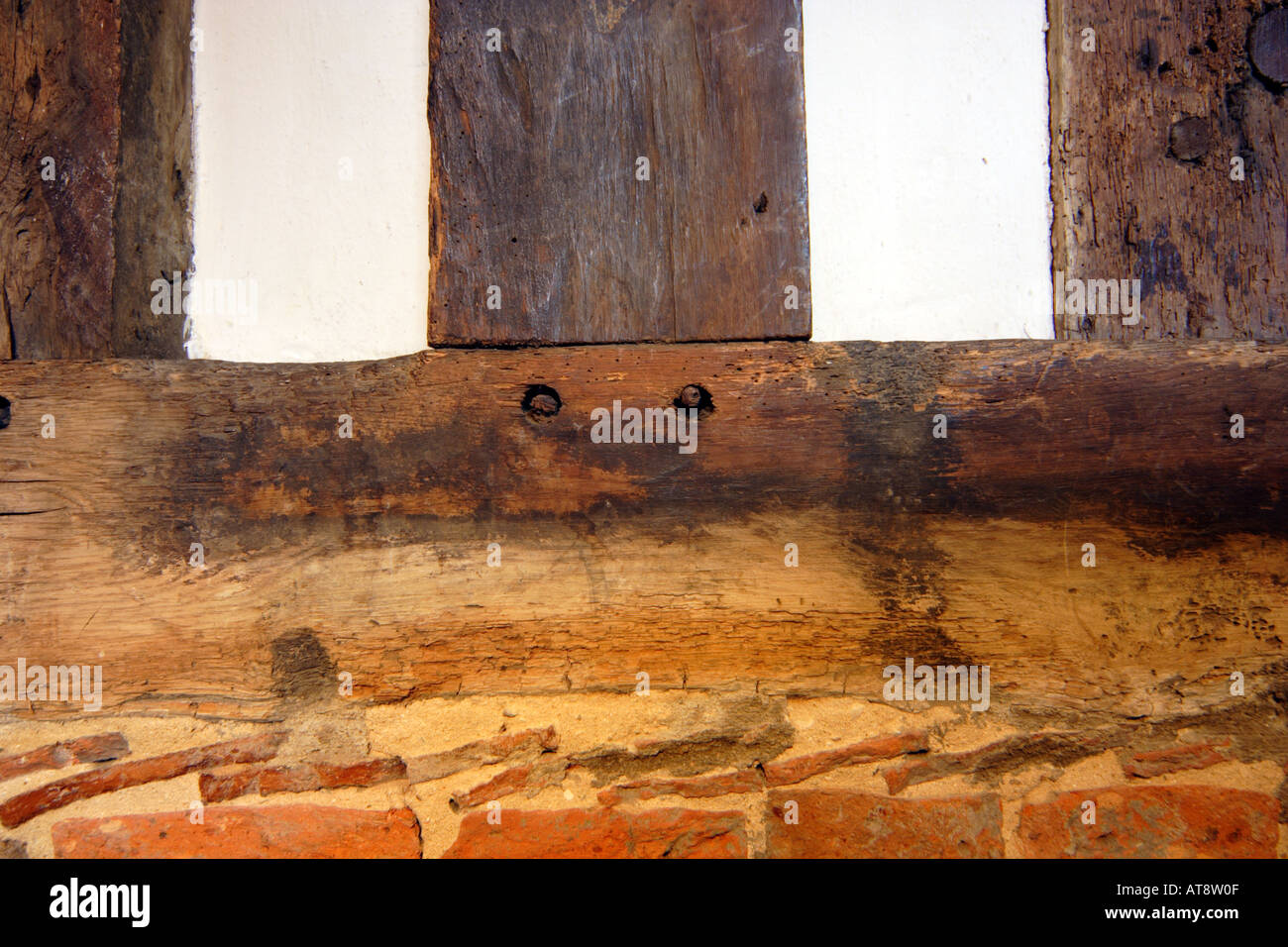 Medieval timber framed house sill beam with strut showing peg holes to ...
