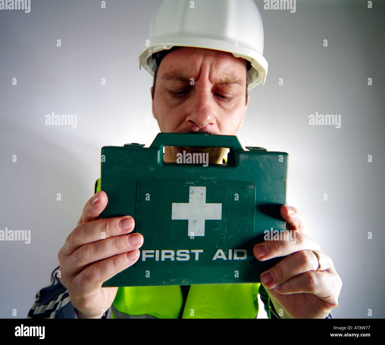 Construction worker with first aid box Stock Photo - Alamy