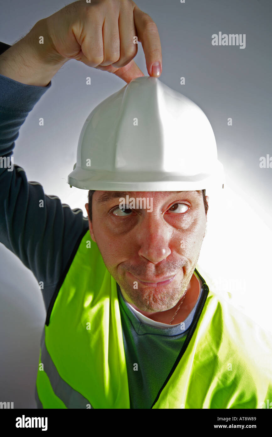 Construction worker looking more than confused Stock Photo - Alamy