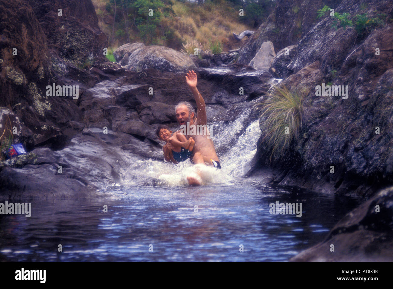 Father son waterfall hi-res stock photography and images - Alamy