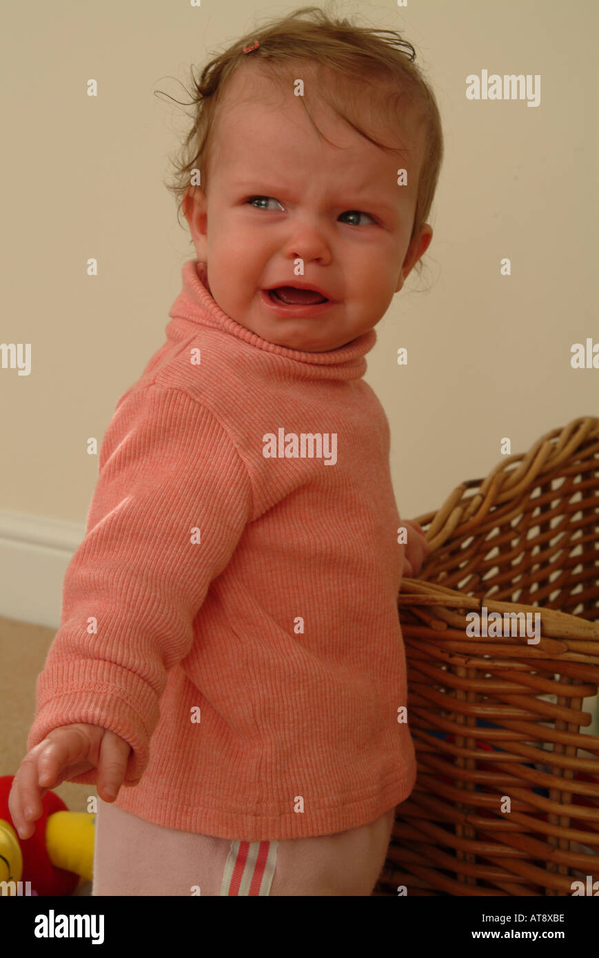 Baby crying alone hi-res stock photography and images - Alamy