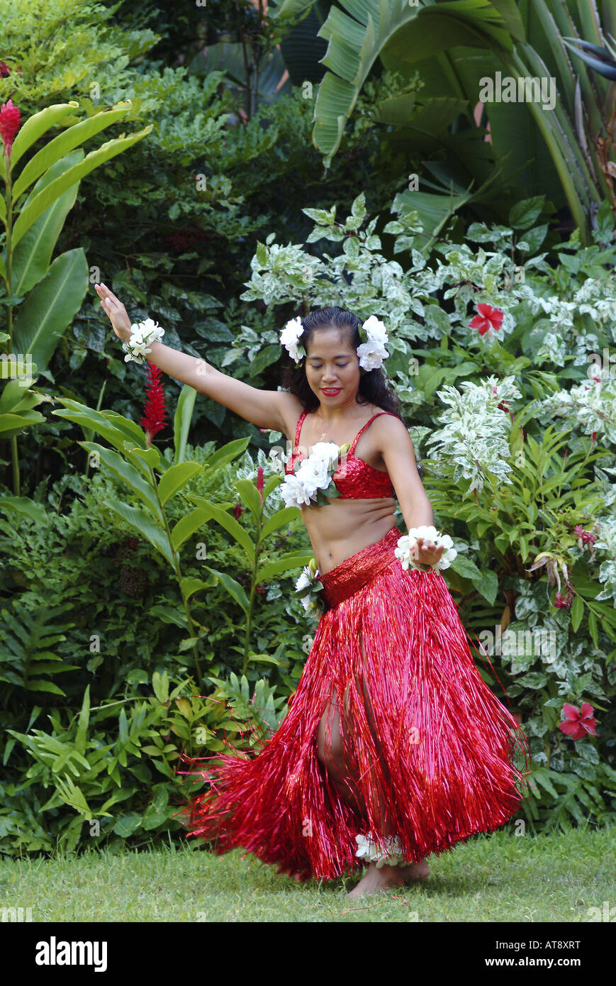 Hapa-Haole hula dancer preparing to dance at the Royal Hawaiian Hotel ...