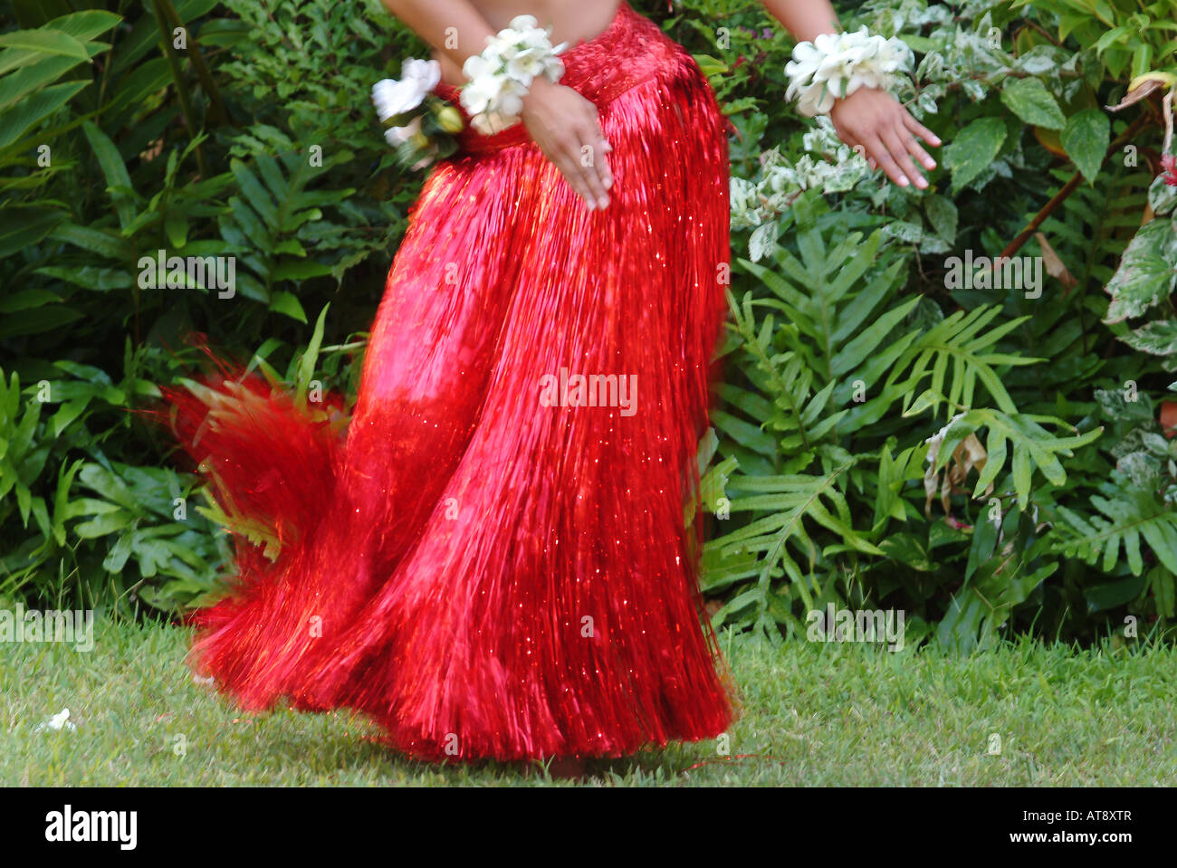 Hapa-Haole hula dancer preparing to dance at the Royal Hawaiian Hotel ...