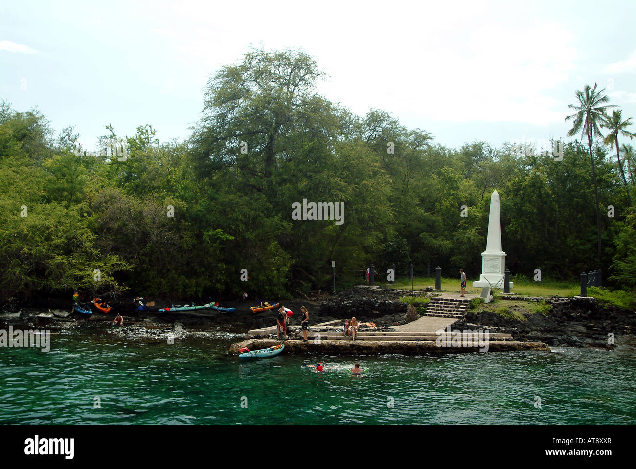 Kayakers resting at Captain James Cook monument at Kealakekua bay, the ...
