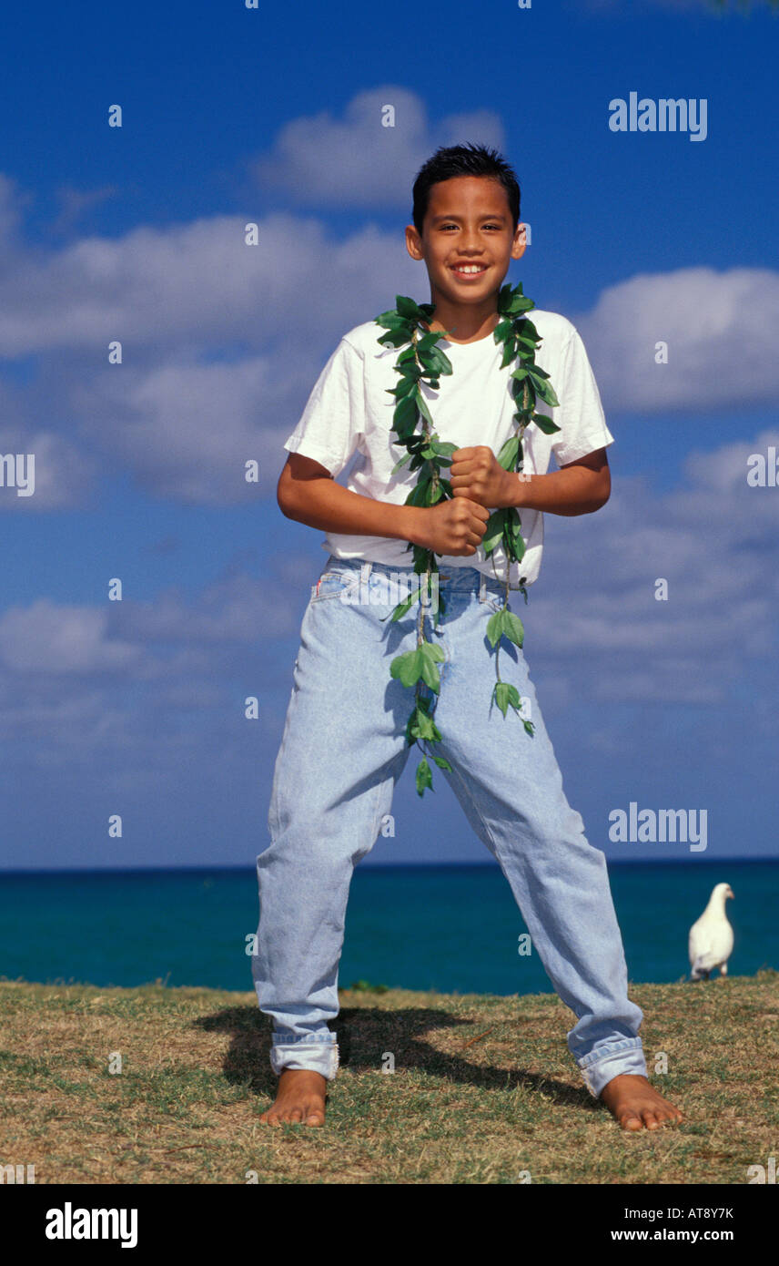 Boy dances auana(modern) hula with maile lei on Stock Photo - Alamy