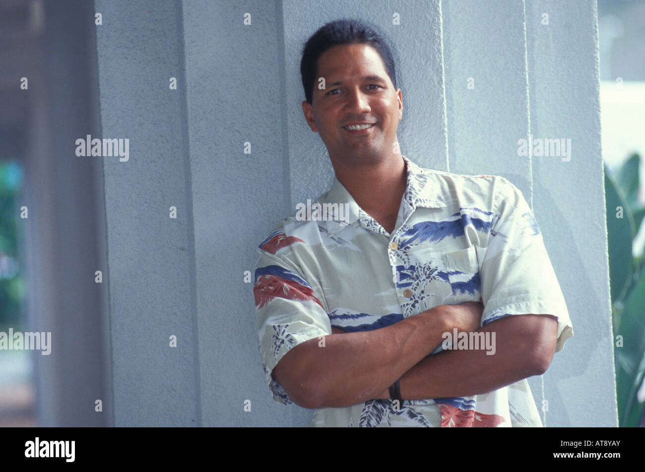 Young Hawaiian man in aloha shirt Stock Photo - Alamy