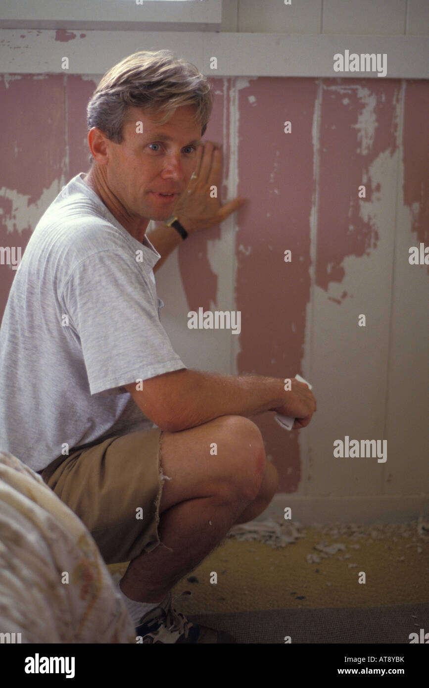 Man remodeling the interior of a house with fresh paint Stock Photo - Alamy