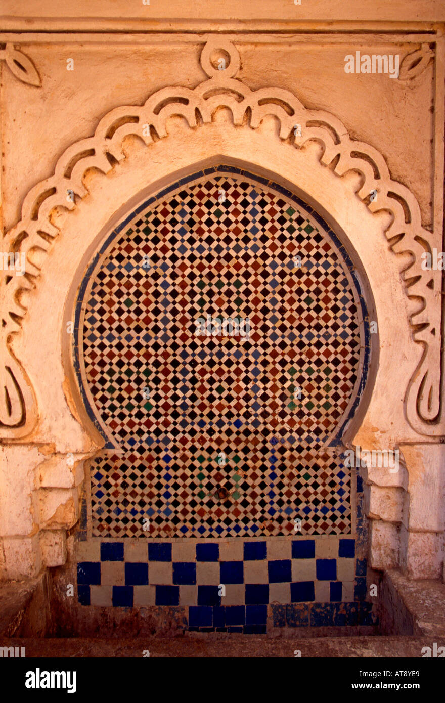 Water fountain with horseshoe-shaped arch, medina, Fes el-Bali, city of ...
