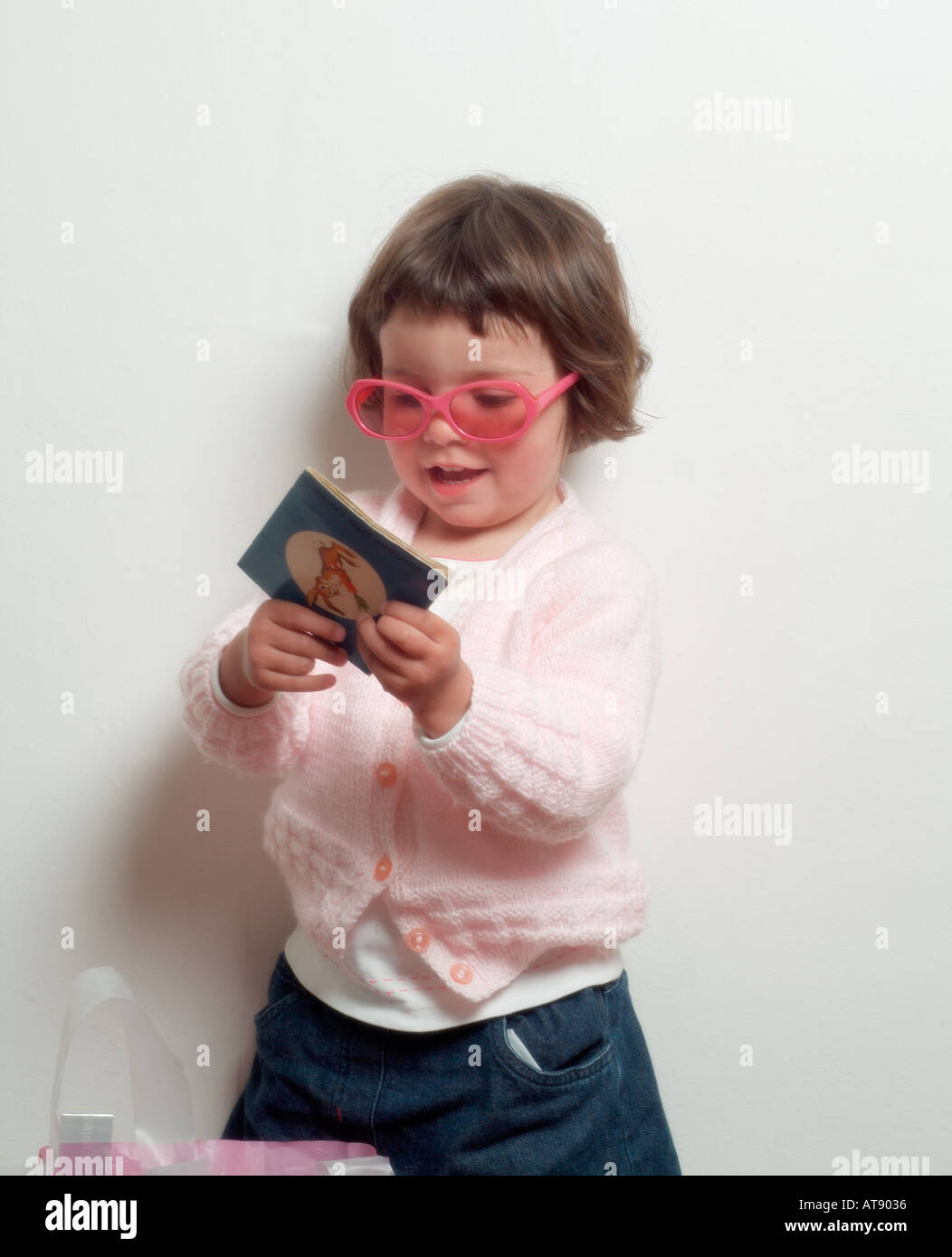 child with a book Stock Photo - Alamy