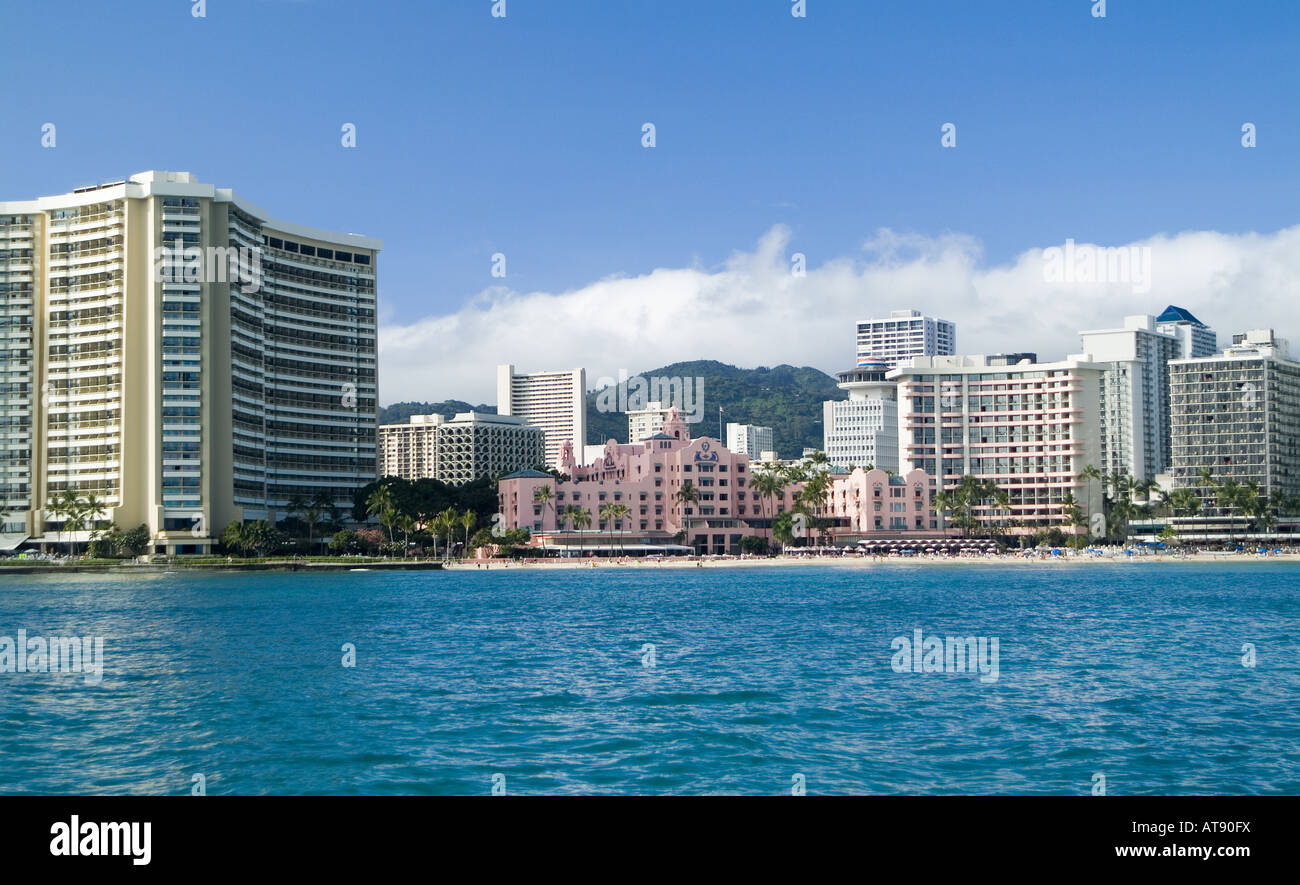 The Sheraton Waikiki and Royal Hawaiian Hotel with clear blue water in ...