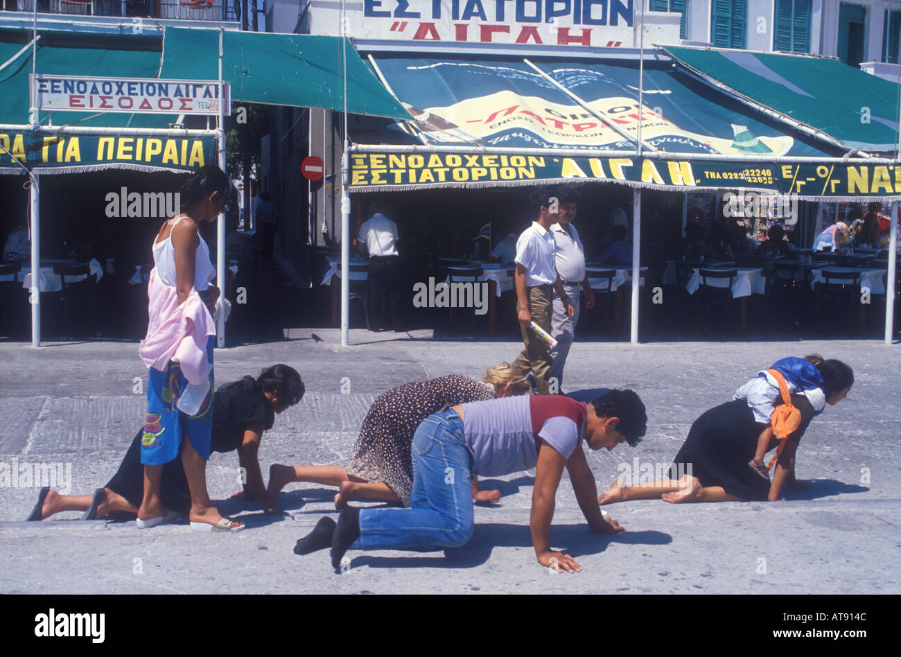 group of penitents creeping on th street in Tinos place of Panagia ...