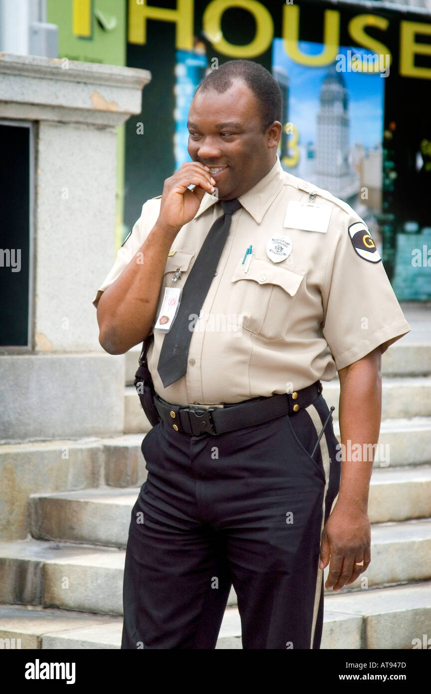 Black security officer hi-res stock photography and images - Alamy